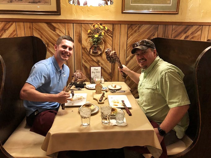 At The Big Steer, every meal is an adventure. Just ask these happy diners, wielding their steak knives like modern-day culinary explorers.