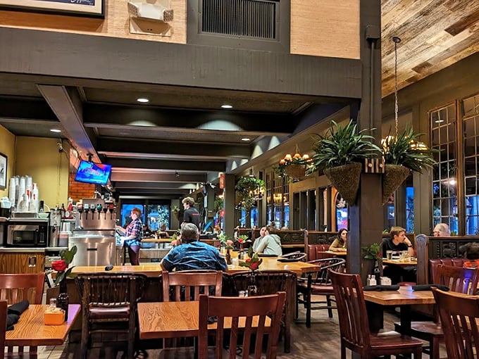 Cozy corner alert! The Kettle's dining area feels like your favorite aunt's living room, if your aunt was a gourmet chef with impeccable taste in lighting.