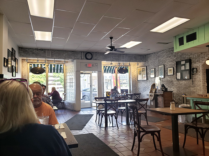 Welcome to the dining room, where every table tells a story and every booth has absorbed decades of laughter and syrup spills.