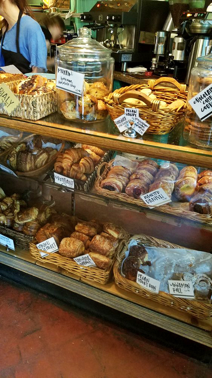A treasure trove of carbs! This display case is like Aladdin's cave for pastry enthusiasts, filled with golden, flaky wonders.
