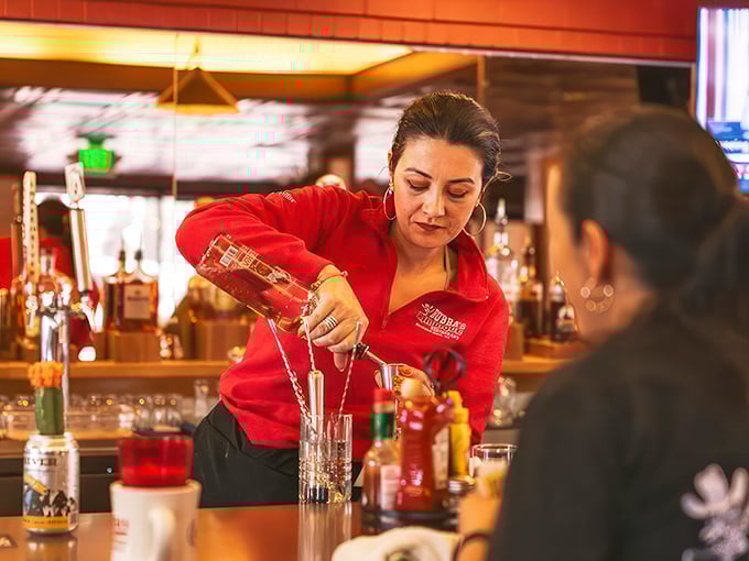 The unsung hero of your barbecue experience, crafting liquid happiness one drink at a time. Cheers to the mixology maestro!