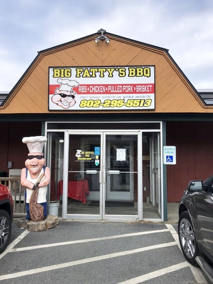 The gateway to flavor town! Big Fatty's entrance, complete with mascot, promises a tasty adventure for your taste buds.