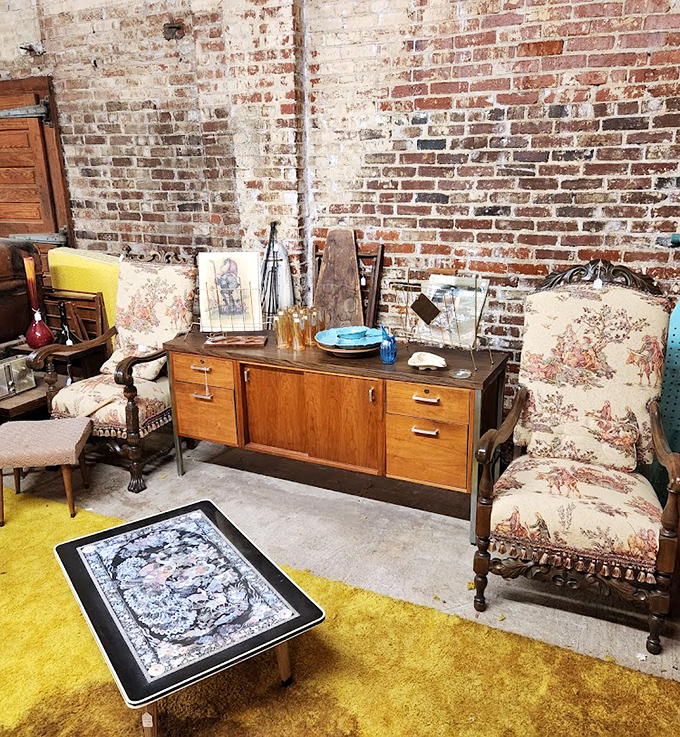 Mid-century modern meets "The Brady Bunch" in this furniture vignette. That shag carpet? Groovy, baby!