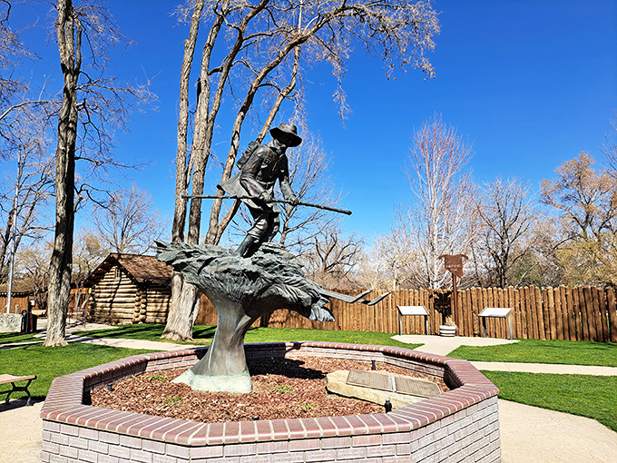 This statue's got some serious altitude! John A. Thompson stands tall, reminding us that neither snow nor rain stays these couriers.