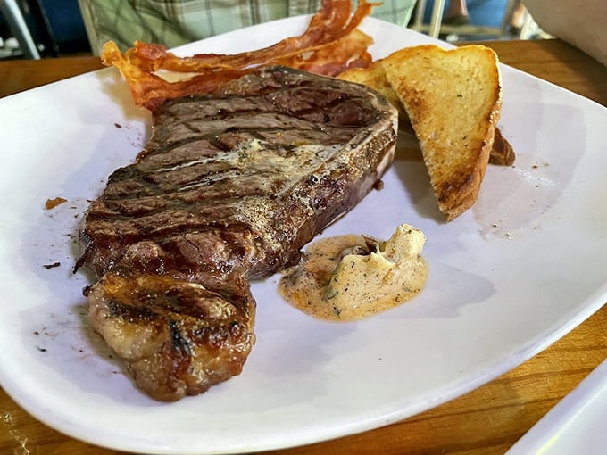 Surf meets turf in spectacular fashion! This steak looks so good, it might make you forget you're in a seafood joint.