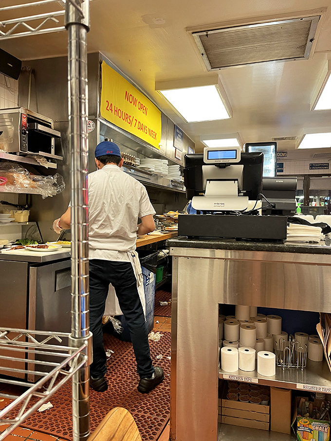 Where the magic happens! The kitchen bustles like a well-oiled machine, churning out comfort food 24/7.