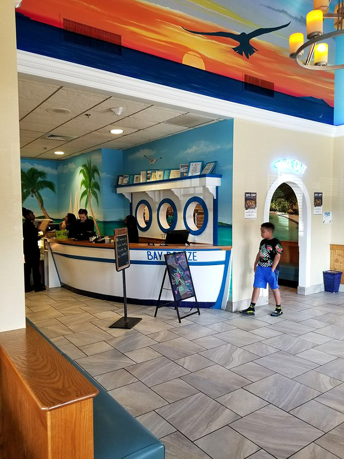 Welcome aboard the S.S. Bay Breeze! This nautical-themed lobby sets the stage for your seafood adventure.
