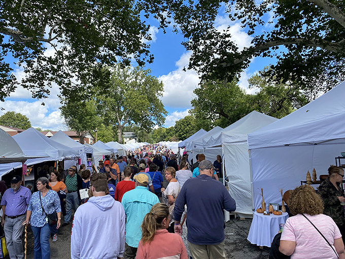 The Madison Chautauqua Festival transforms streets into rivers of art lovers, flowing between white tents in search of treasures and funnel cake.