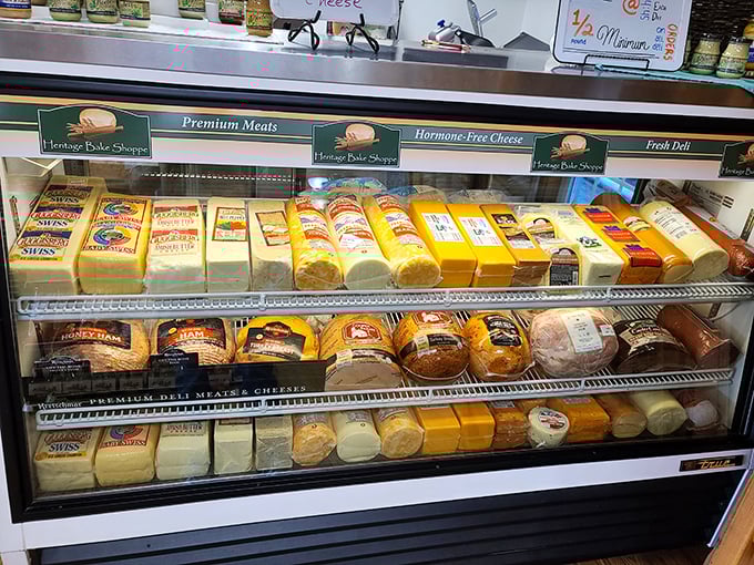 The deli case showcases cheese in every shade of yellow imaginable, from "subtle cheddar whisper" to "sharp enough to wake the neighbors."