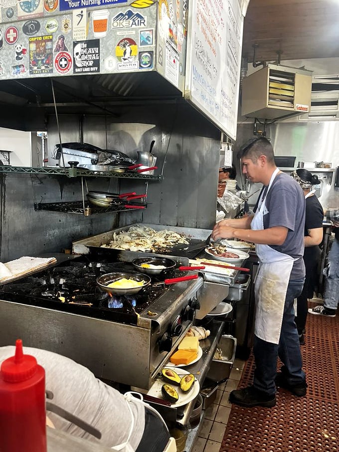 Where the magic happens! The open kitchen is a symphony of sizzles and aromas that'll make your stomach growl in anticipation.