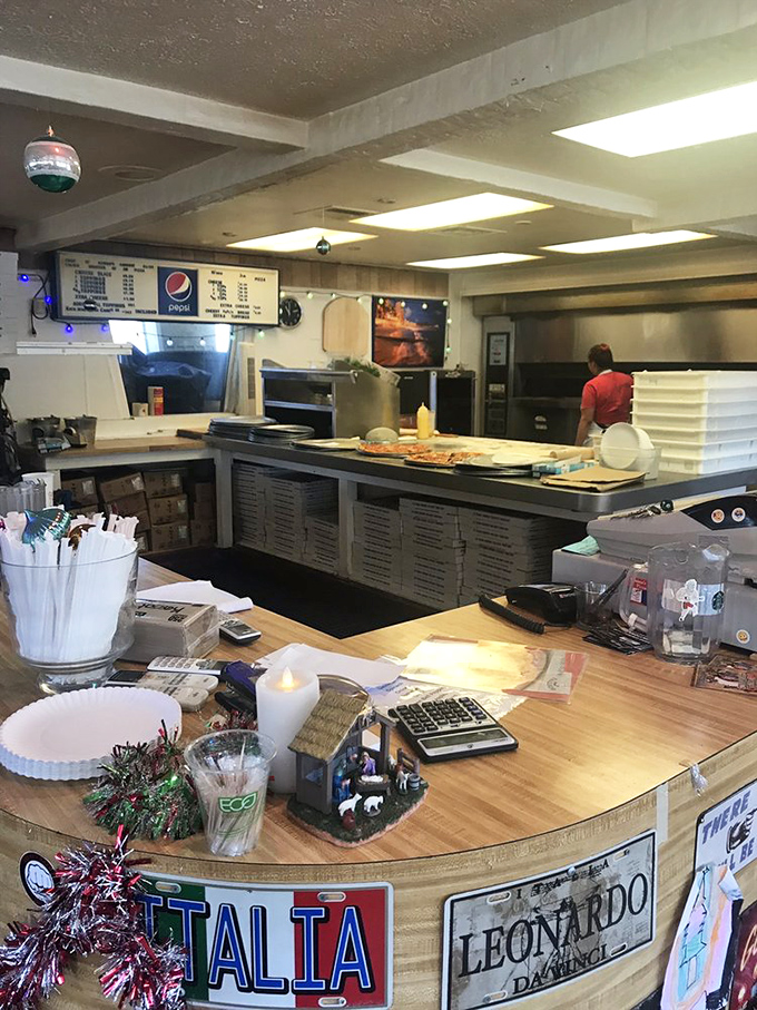Where the magic happens! This open kitchen is like a front-row seat to the greatest show on earth: pizza making!