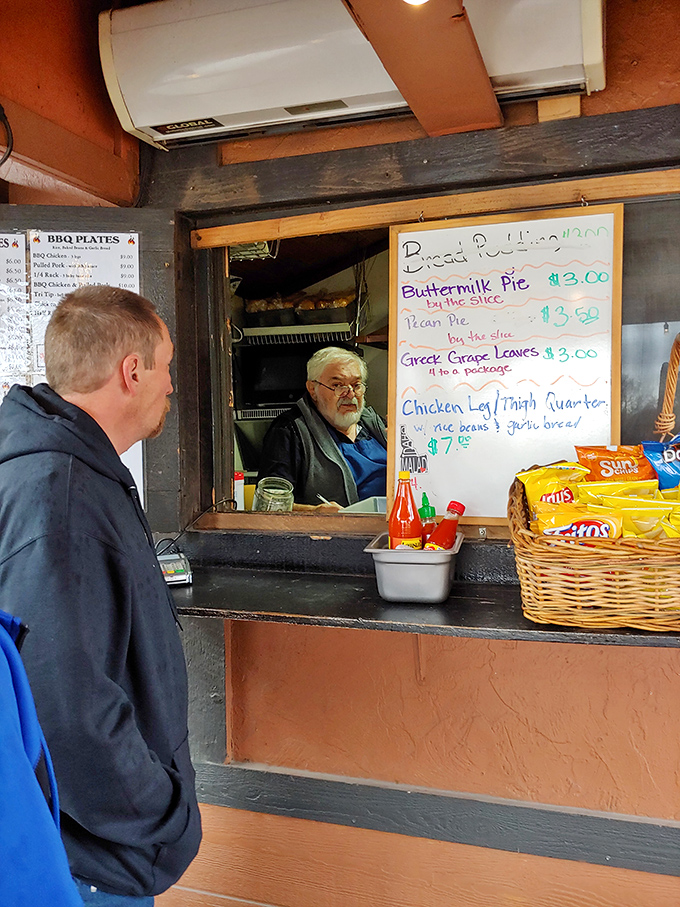 Where the magic happens! This order window is like a portal to a world of smoky, savory delights.