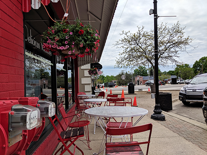 Al fresco feast, anyone? These cheery red chairs are just begging for you to plop down with a pie and watch the world go by.