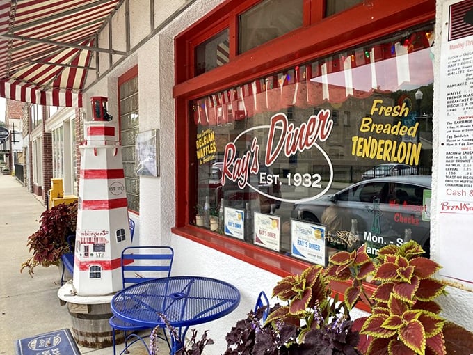 The window proudly announces "Est. 1932"&mdash;because when you've been serving "Fresh Breaded Tenderloin" for 90 years, you've earned bragging rights.