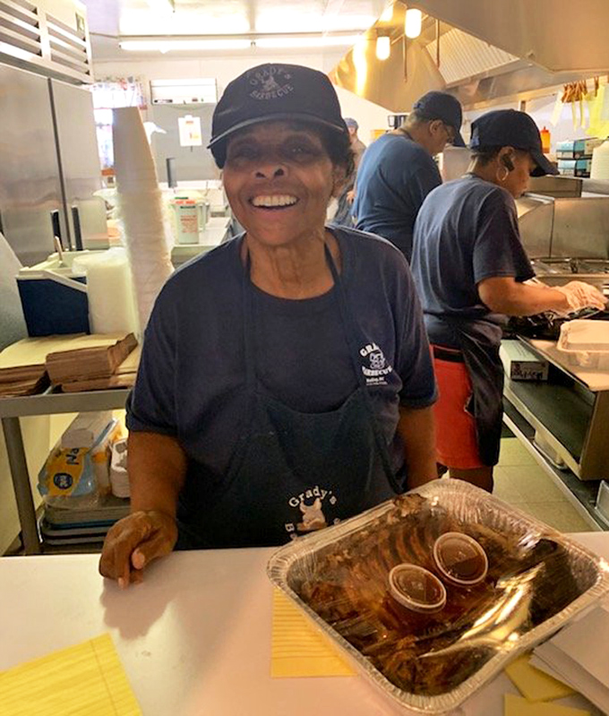 The smile that launched a thousand ships... of barbecue. Meet the friendly face behind the flavor at Grady's.