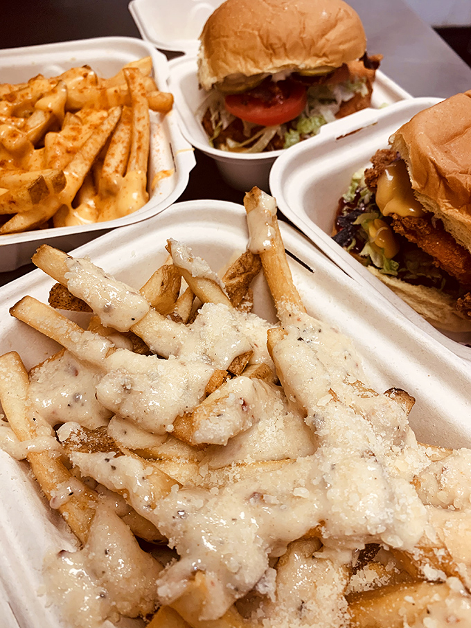 Fries so saucy, they're practically flirting! And those burgers? They're giving "bun in the oven" a whole new meaning.