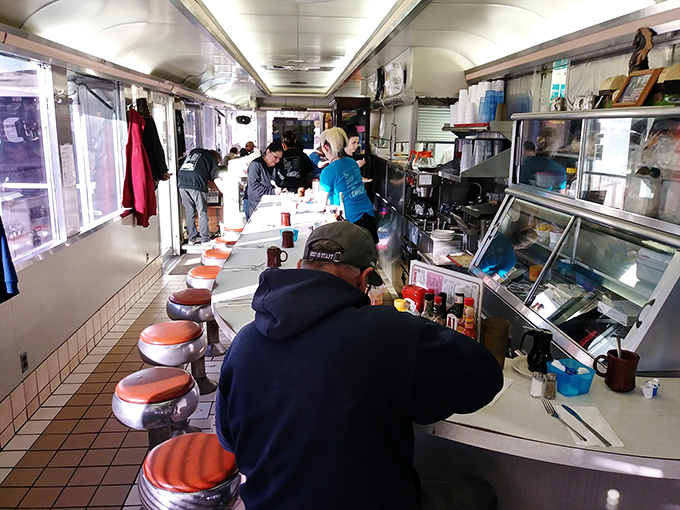 The real MVPs of mealtime! These hardworking staff members are flipping, serving, and smiling their way into our hearts (and stomachs).