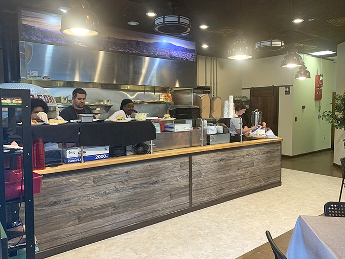 The kitchen crew: Biscuit wizards at work. Watch them transform flour and butter into edible magic.