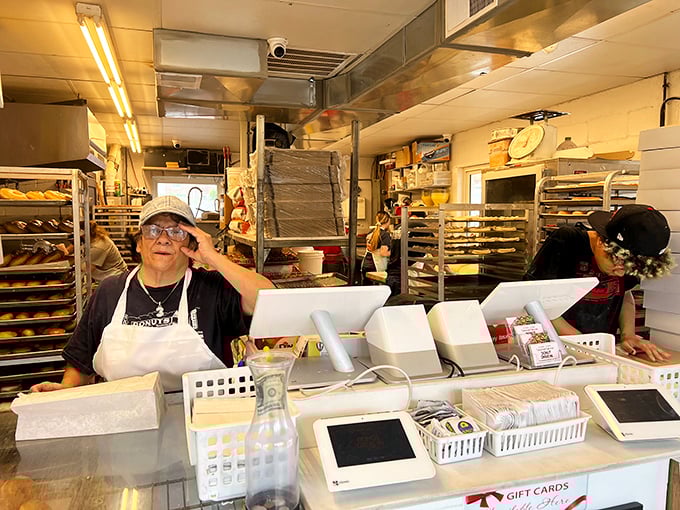 Masters of the donut domain! These aren't just staff; they're wizards, conjuring up spellbinding treats with a smile.