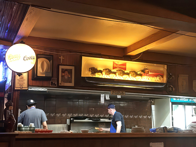 Where the magic happens! These kitchen wizards are the unsung heroes behind your perfectly grilled steak and crispy fries.