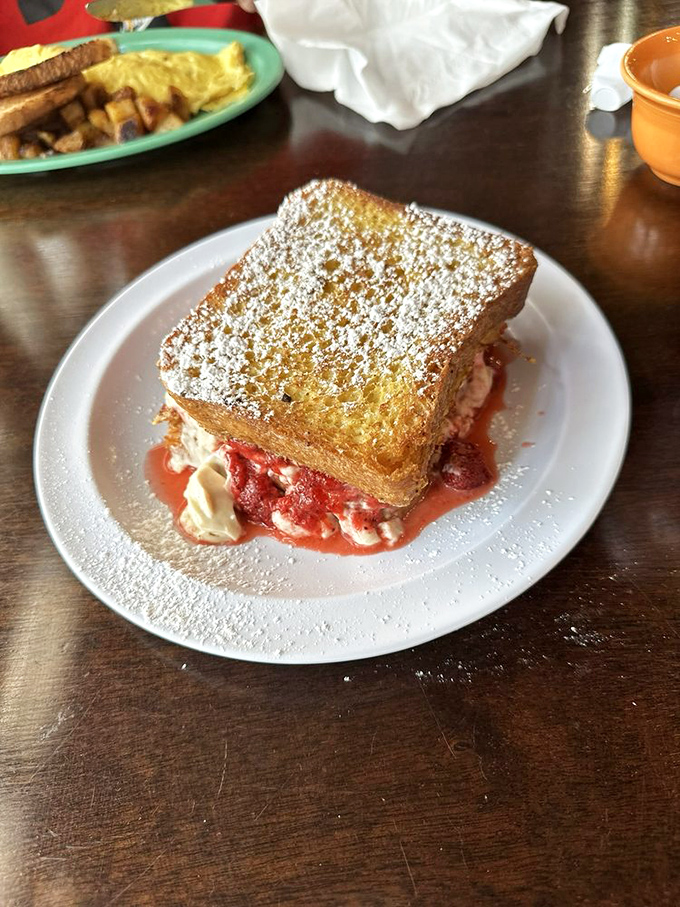French toast that's dressed to impress! This powdered sugar-dusted beauty is ready for its close-up - and your eager fork.
