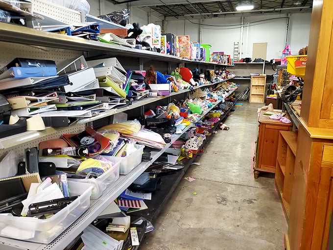Organized chaos or chaotic organization? This aisle is where office supplies go to retire and toys come for their second act.