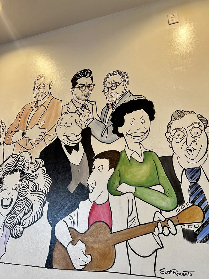 Wall art that celebrates Jewish comedy legends gives you something to admire while waiting for your sandwich, proving good taste extends beyond the kitchen.