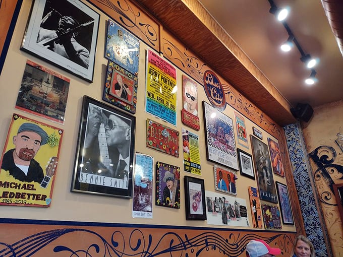 More than decoration: These walls tell stories of blues legends and sandwich devotees, creating the perfect ambiance for culinary magic.