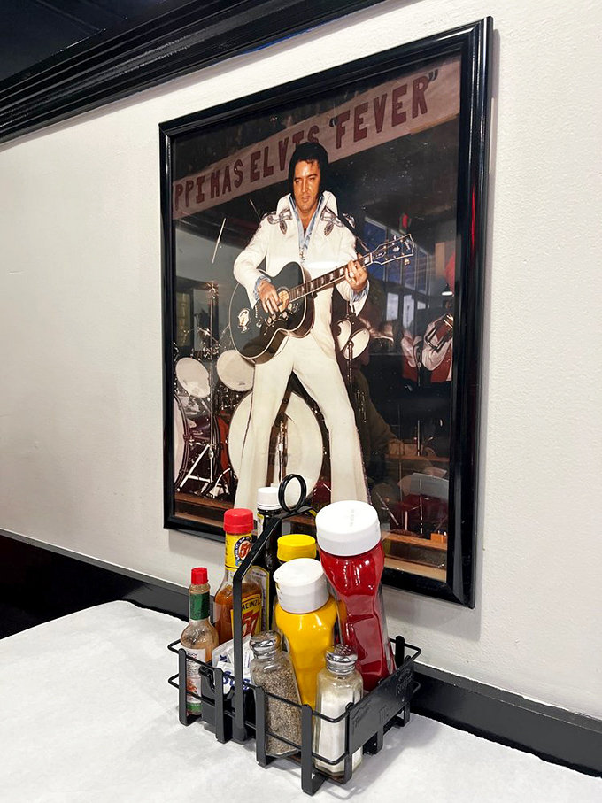 Elvis watches over diners from his place of honor on the wall. The King would approve of the comfort food being served below.