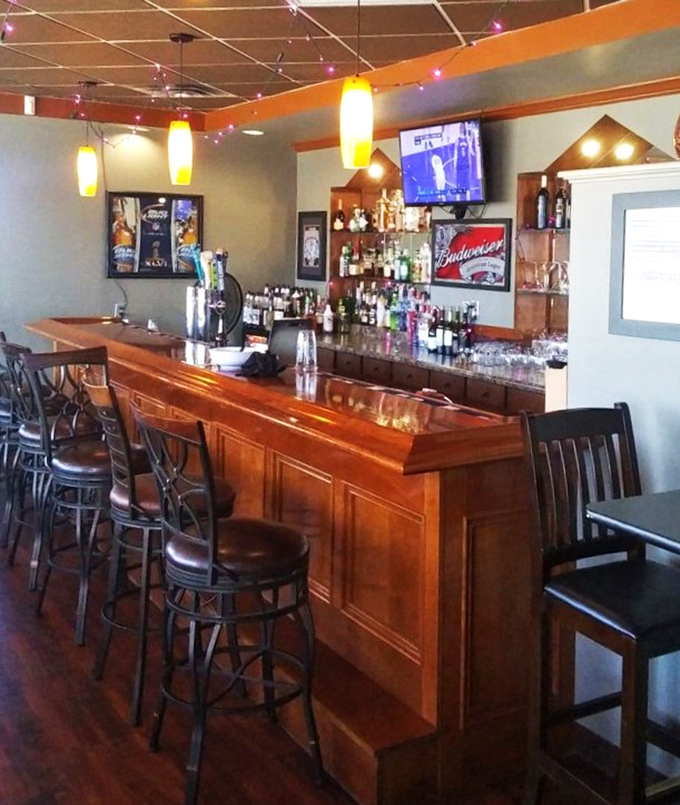 This bar isn't just serving drinks, it's serving memories. Each stool has probably heard more stories than a bartender on a Saturday night.