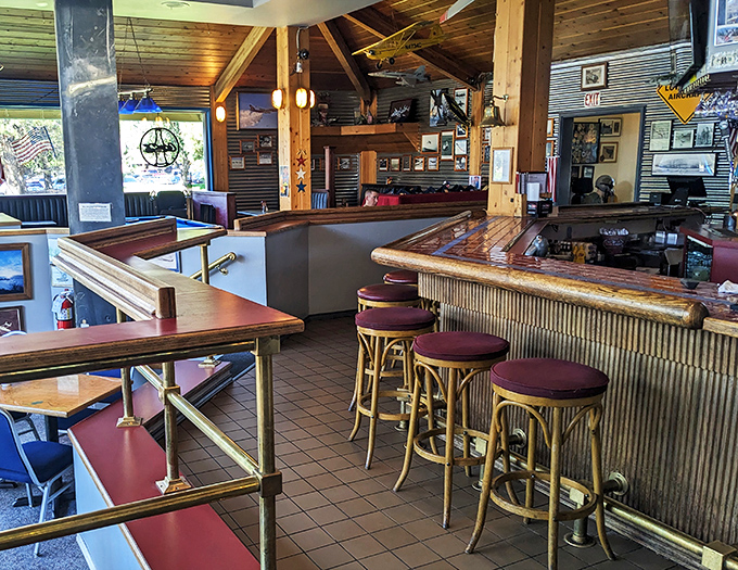 Belly up to this boarding gate... er, bar! It's the perfect spot to watch your drinks take flight.