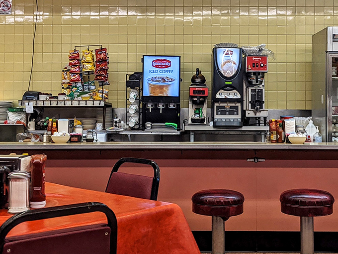 Soda fountain dreams come true! This classic counter setup is where milkshake magic happens, and diet plans go to die (but in the best way possible).