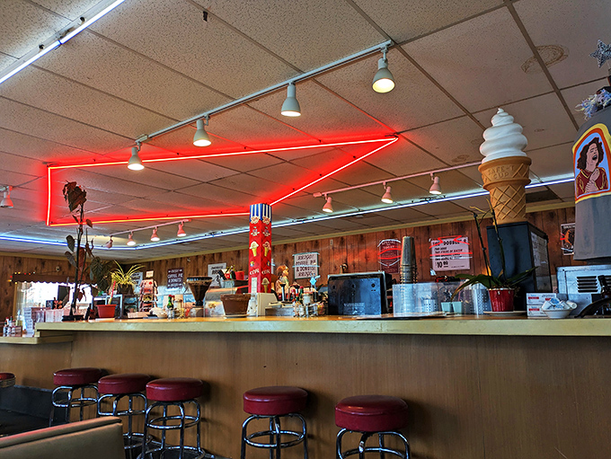 Where retro meets delicious! This counter is like a time portal to simpler days, complete with a neon glow and the promise of pie.