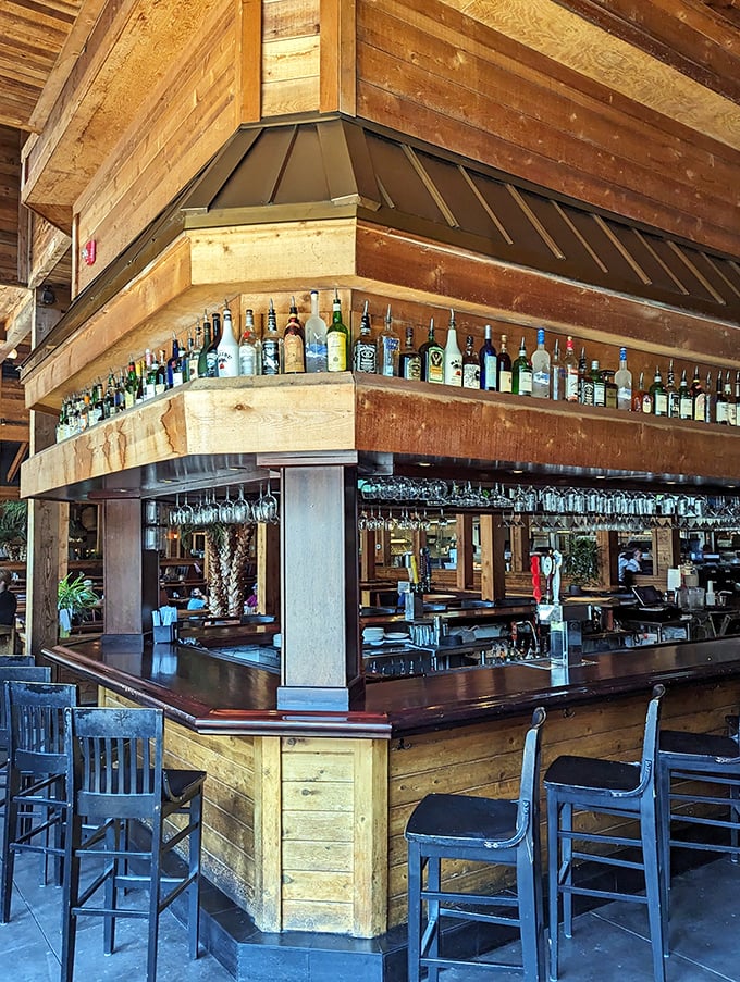 At this bar, bottles stand like soldiers on parade, ready to contribute to an evening of relaxation and indulgence.