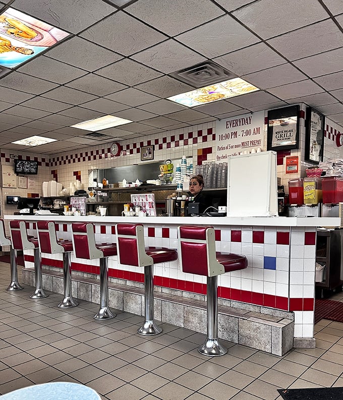 The counter experience&mdash;where solo diners find community, regulars establish territories, and the grill's sizzle provides the perfect soundtrack.