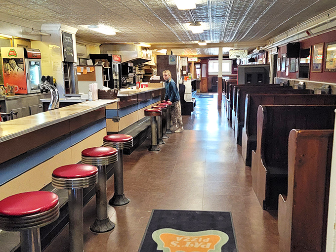 Pull up a stool and prepare for pizza perfection. This counter has seen more delicious debates than a Food Network marathon.