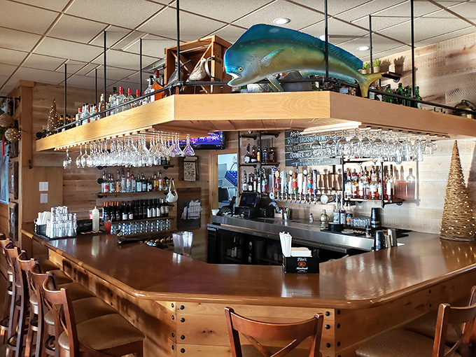 The bar at Bubba's: where maritime meets mixology. With that giant fish overhead, you might feel like you're drinking in Poseidon's man cave.