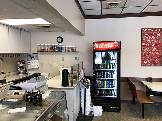 Where the magic happens! This counter is the gateway to donut nirvana, staffed by the high priests of pastry.