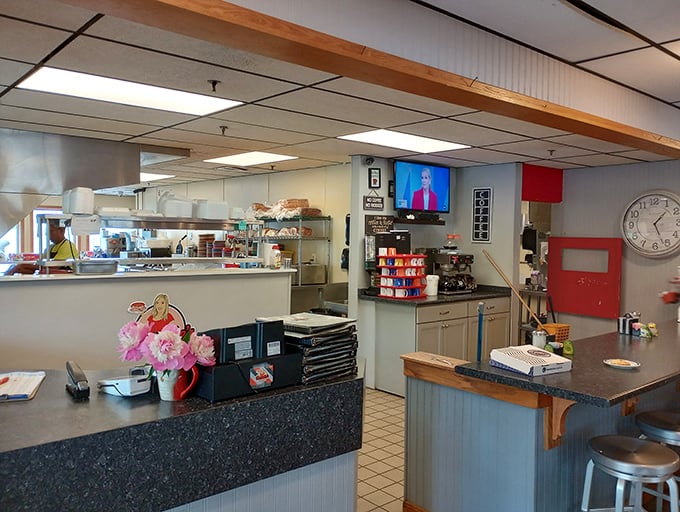 Command central! This bustling counter is where breakfast dreams come true, one steaming plate at a time.