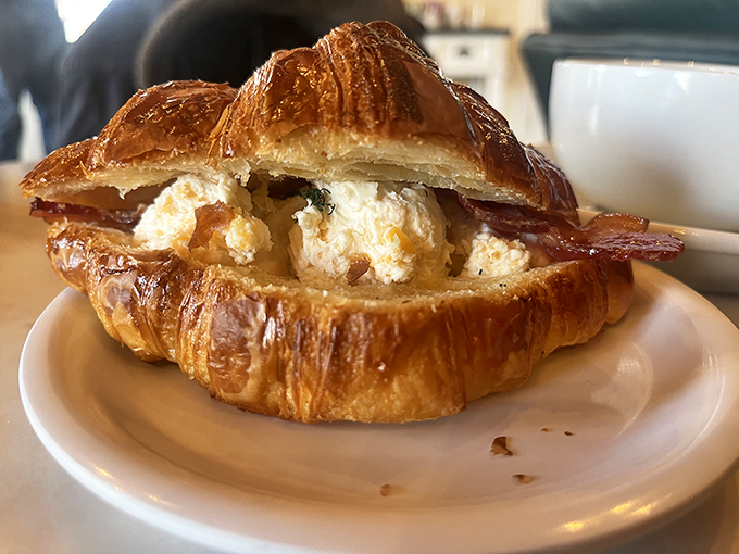 Breakfast of champions! This croissant sandwich looks ready to fuel your day with a perfect balance of flaky and savory.