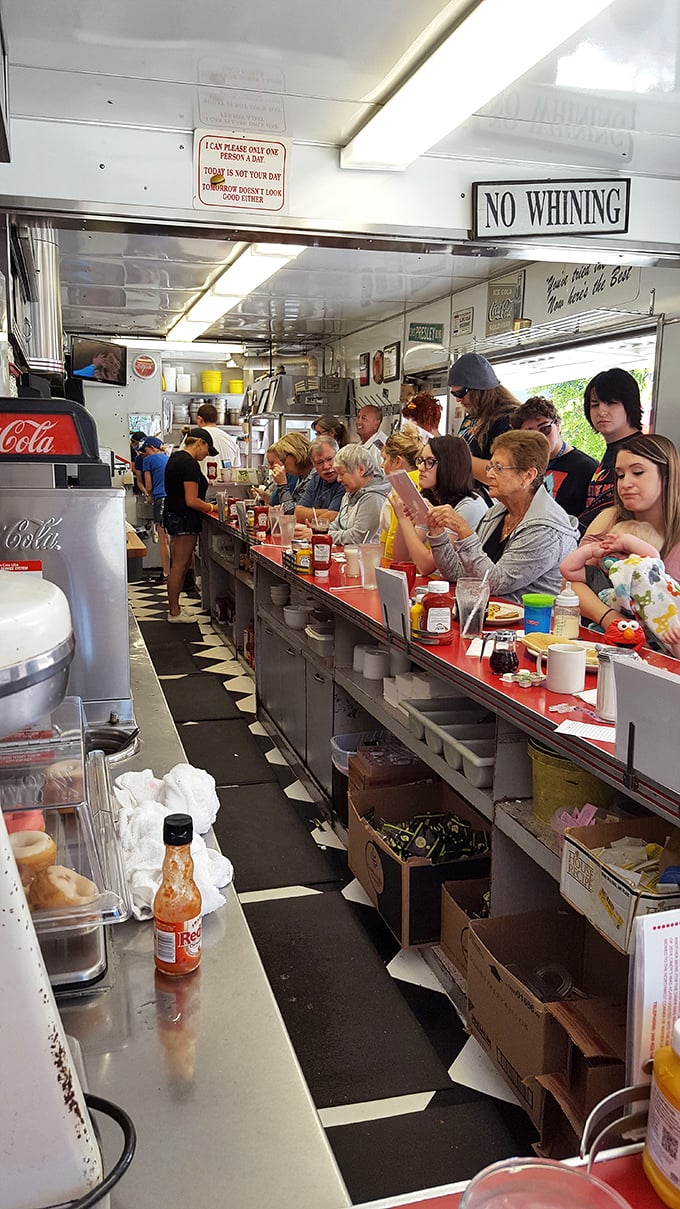 At full capacity, this is democracy in action&mdash;fifteen strangers united by eggs and coffee, with a strict "NO WHINING" policy enforced from above.