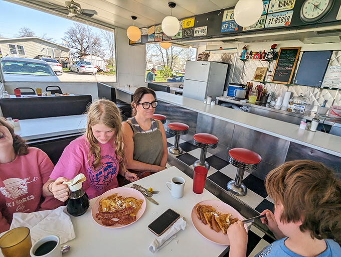 Where strangers become friends over shared love of pancakes. This diner isn't just serving food; it's serving up community with a side of syrup.
