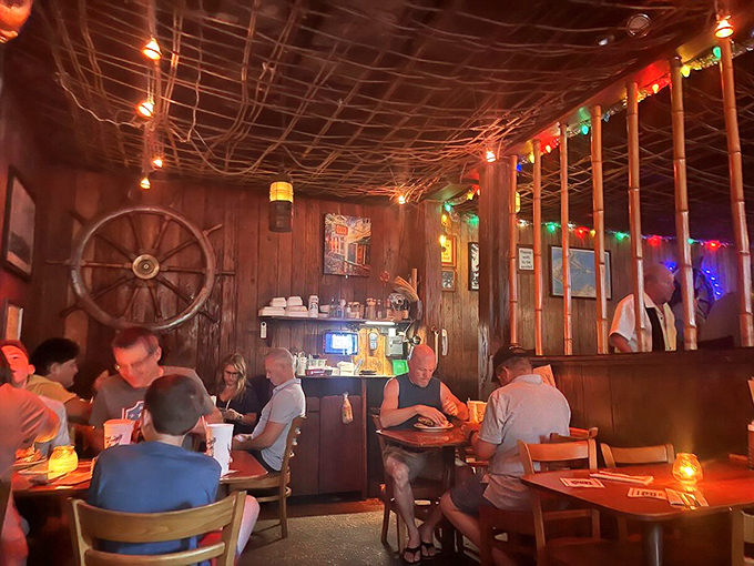 Where strangers become friends over burgers. This dimly lit den of deliciousness is the United Nations of comfort food.