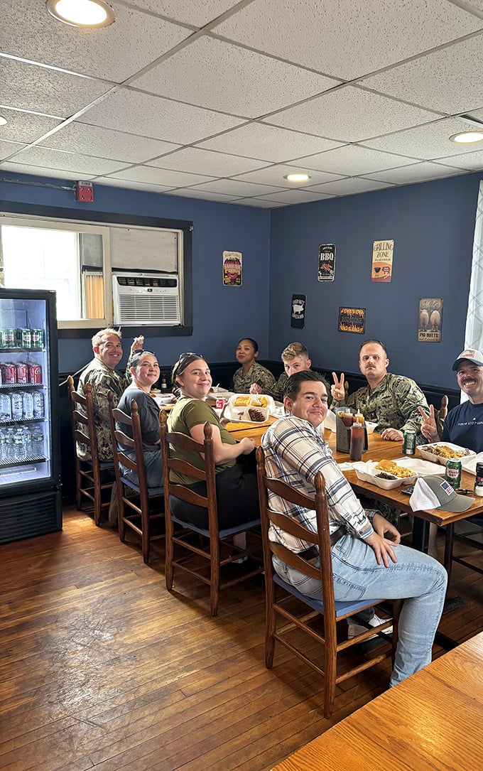 Happy campers alert! Nothing brings people together like great BBQ. These diners know they've struck culinary gold.