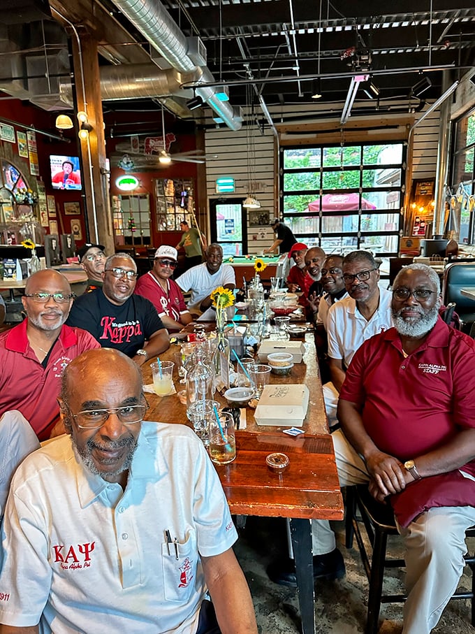 A gathering of food enthusiasts or a BBQ support group? Either way, these folks know where to find their smoky fix.