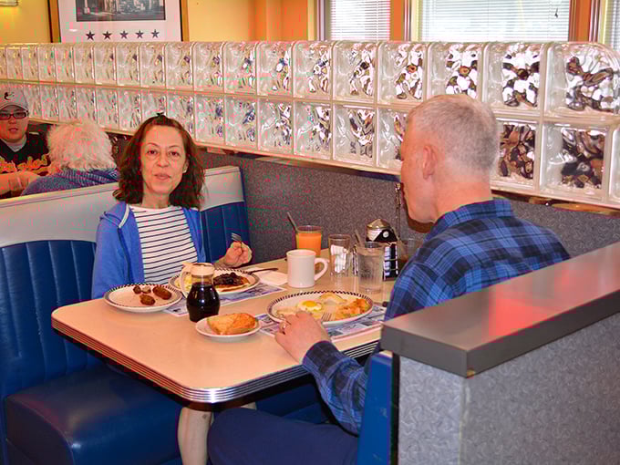 Where strangers become friends over coffee and pie. This booth has probably heard more stories than a bartender on a Friday night.