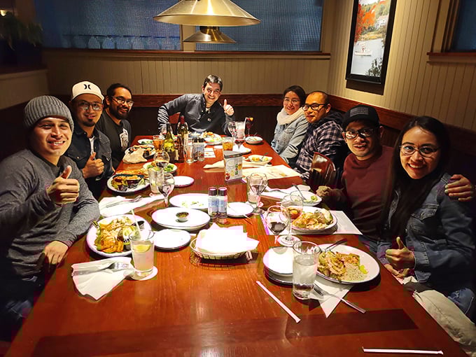 Happy faces all around! This group knows the secret to turning any night into a celebration &ndash; seafood and good company.