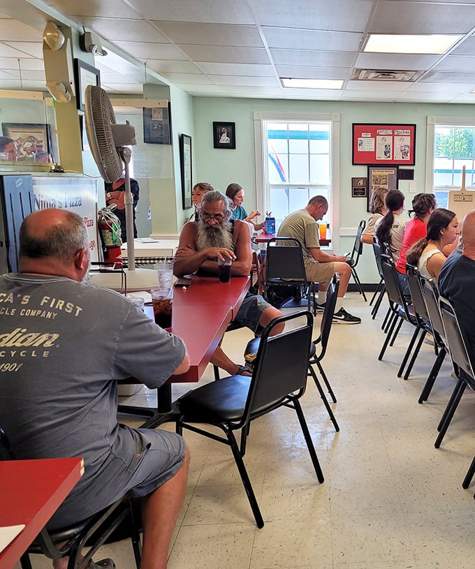 At Nima's, the locals aren't just eating pizza &ndash; they're sharing slices of life. It's like "Cheers," but with better food.