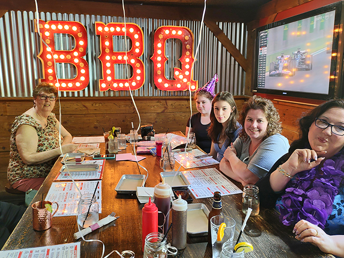 BBQ brings people together! This lively bunch is living proof that good food and great company are the secret sauce of happiness.