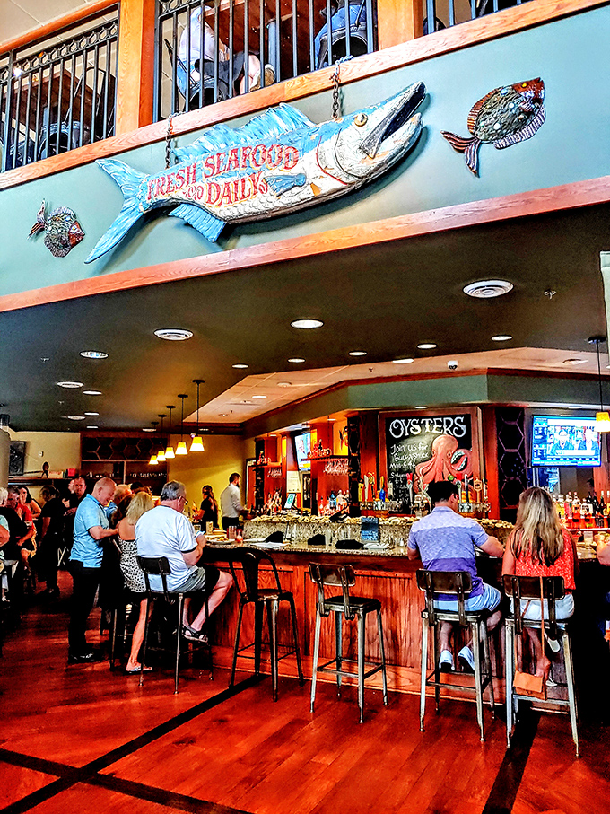 Happy diners at the bar: Where strangers become friends, united by their love for all things seafood and their struggle with lobster bibs.